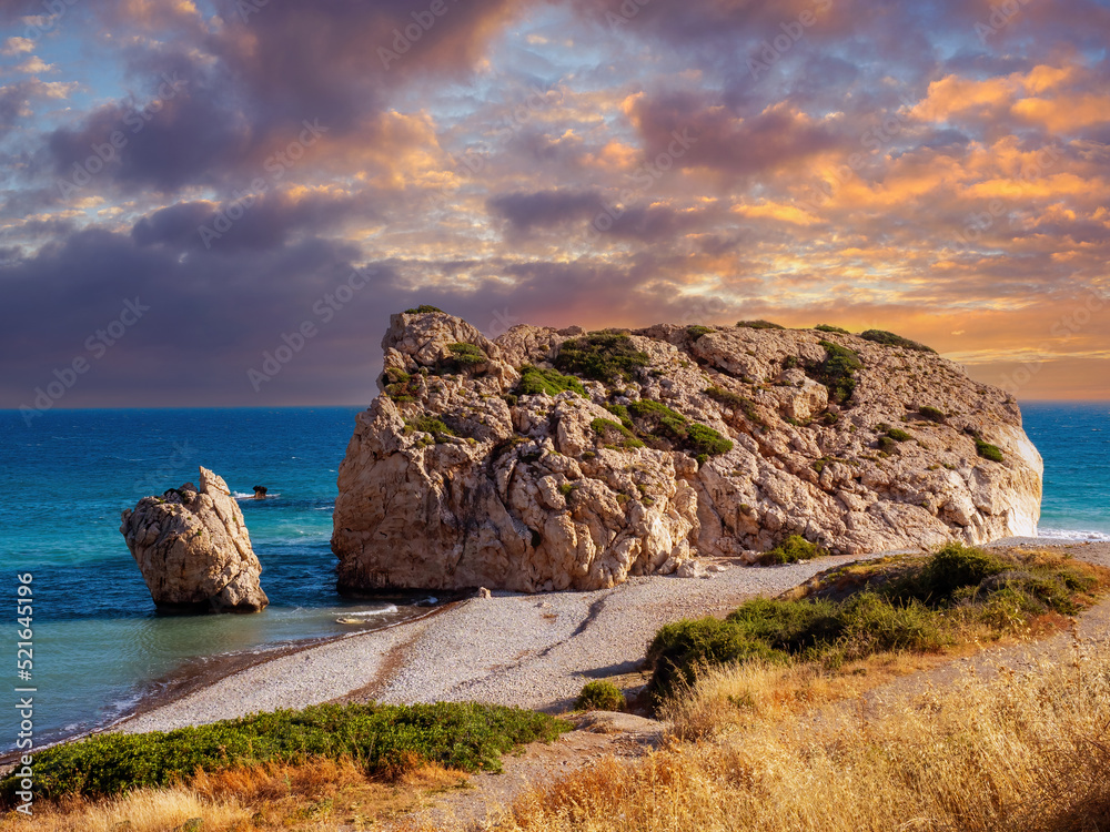 Beaches Cyprus. Rocks of Aphrodite on seashore. Sunset over bay of ...