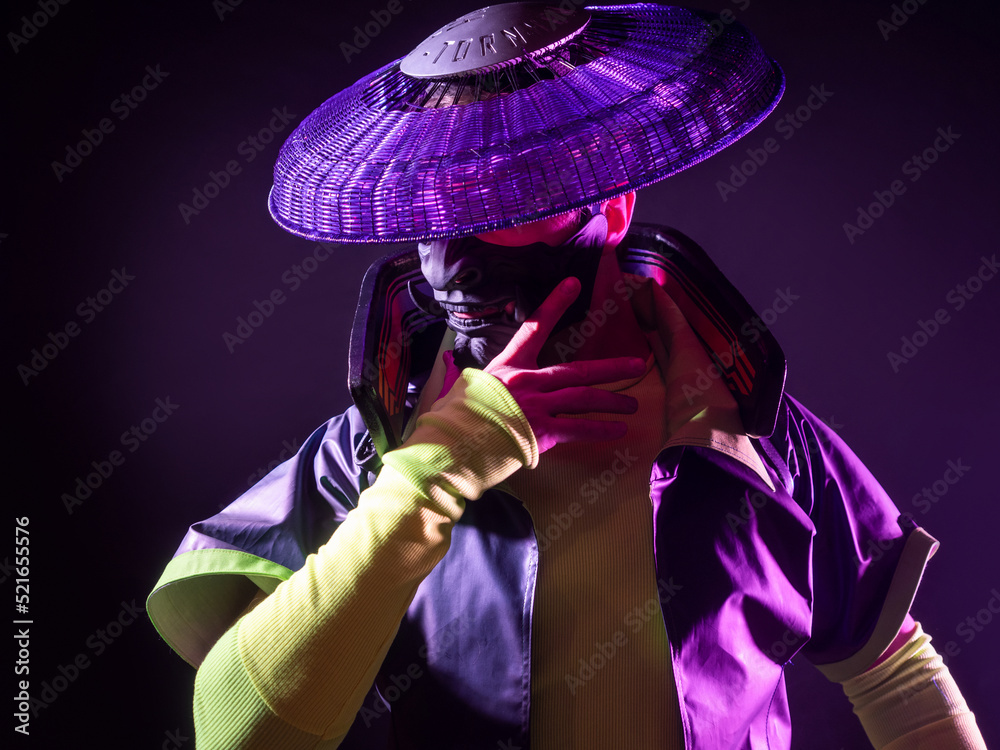 Cyborg killer in a toothy half-face mask and an Asian hat, futuristic ...