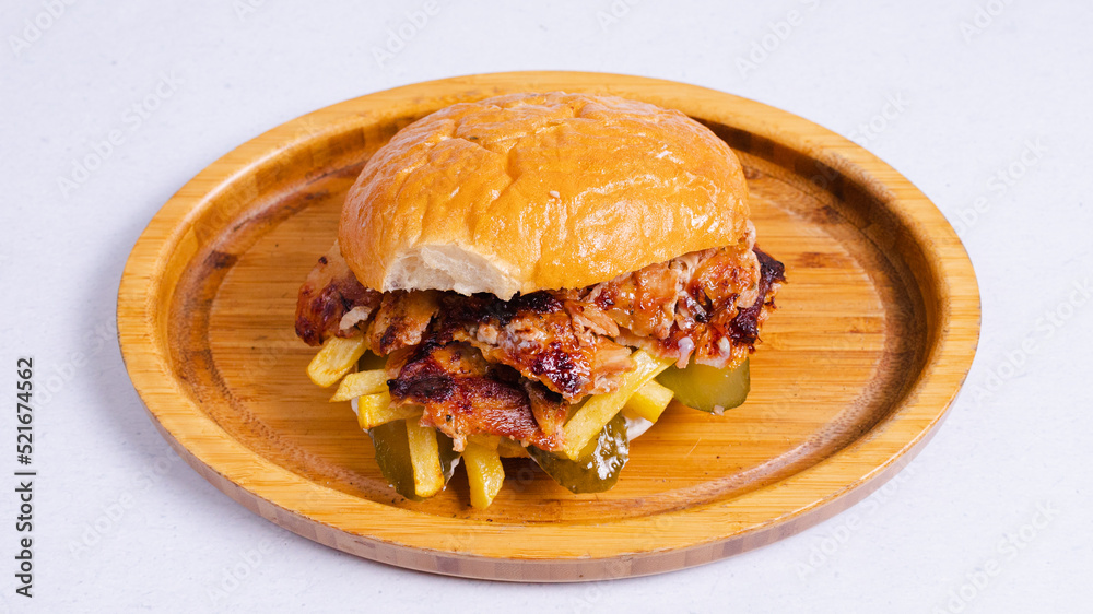 Chicken tombik doner kebab on wooden tray top view isolated Stock Photo ...