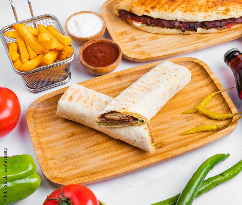 Beef durum kebab, beef doner kebab, french fries basket top view. Beef ...