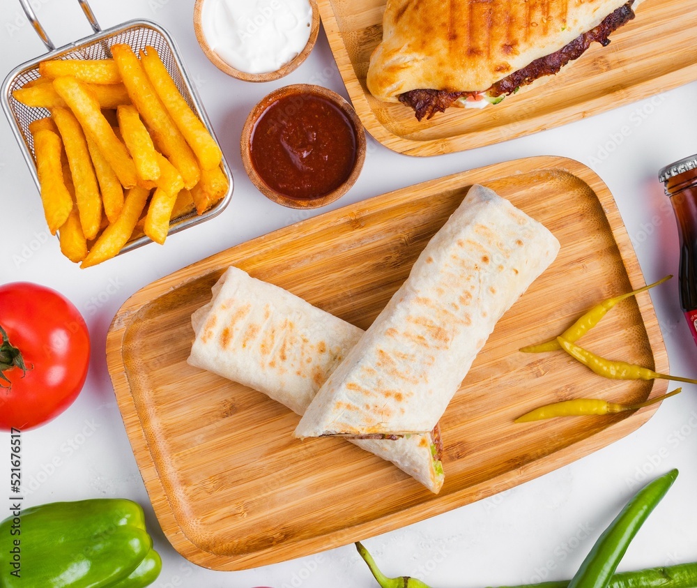 Durum kebab, beef doner kebab, french fries basket top view. Lavash ...