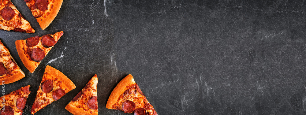 Pepperoni pizza slice corner border. Top view over a dark slate banner ...