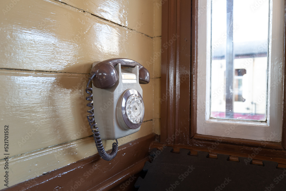 1970s era British Telecommunications phone showing the dial wheel. Seen ...
