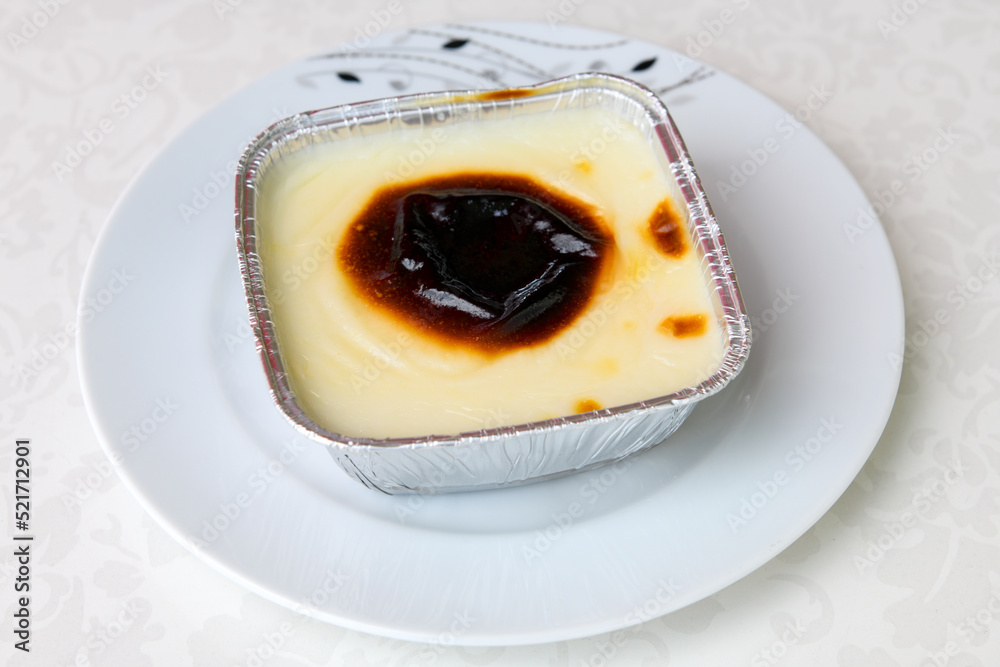 Baked rice pudding turkish milky dessert sutlac, keskul (Turkish name ...