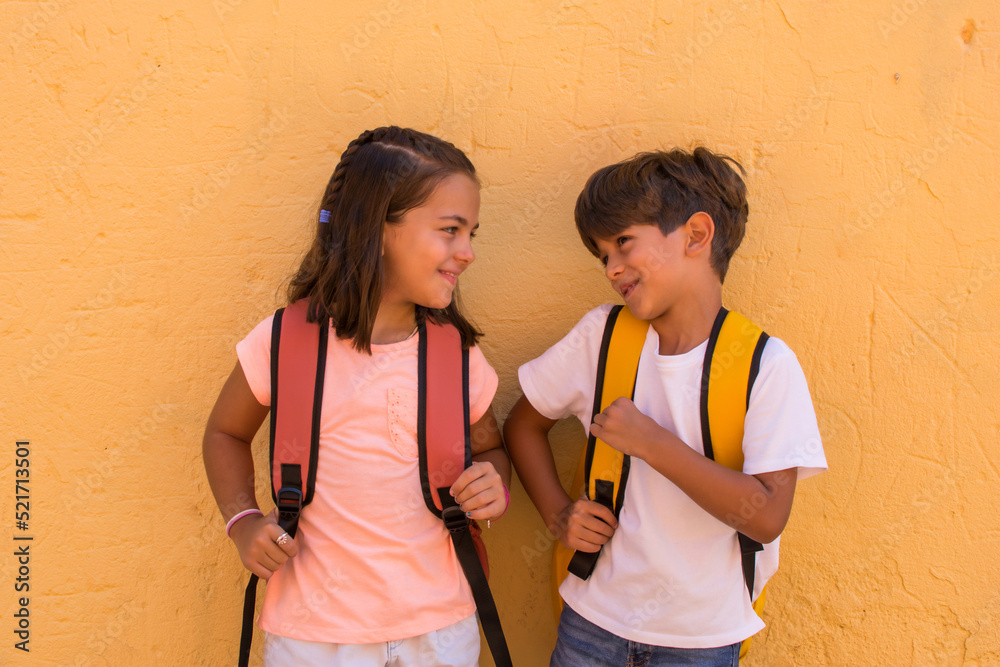 Elementary age children with facial expression of joy on the first day ...