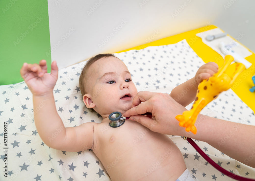 Healthcare and pediatric newborn treatment. Small cute baby doctor ...