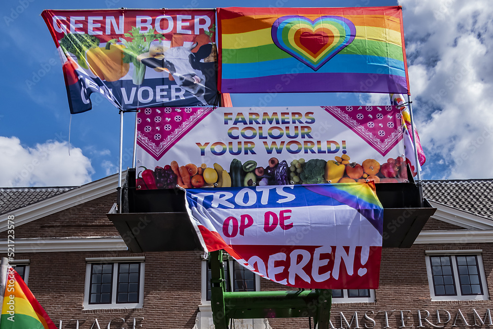 Amsterdam Pride Month Celebration: A rainbow flag displayed outside a ...