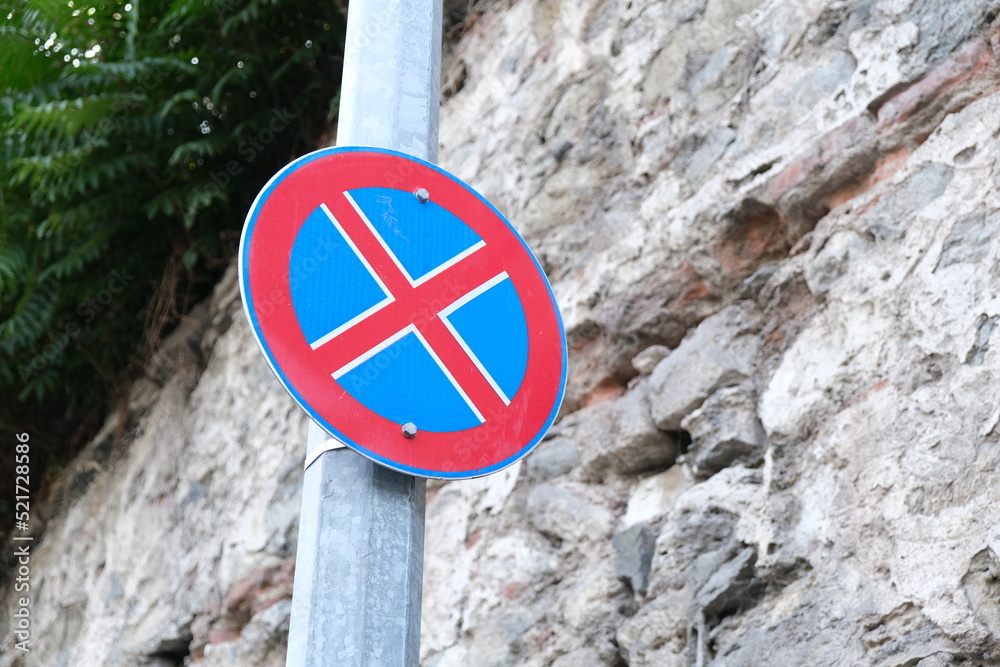 Red and blue traffic sign no parking sign. No stopping or No parking ...