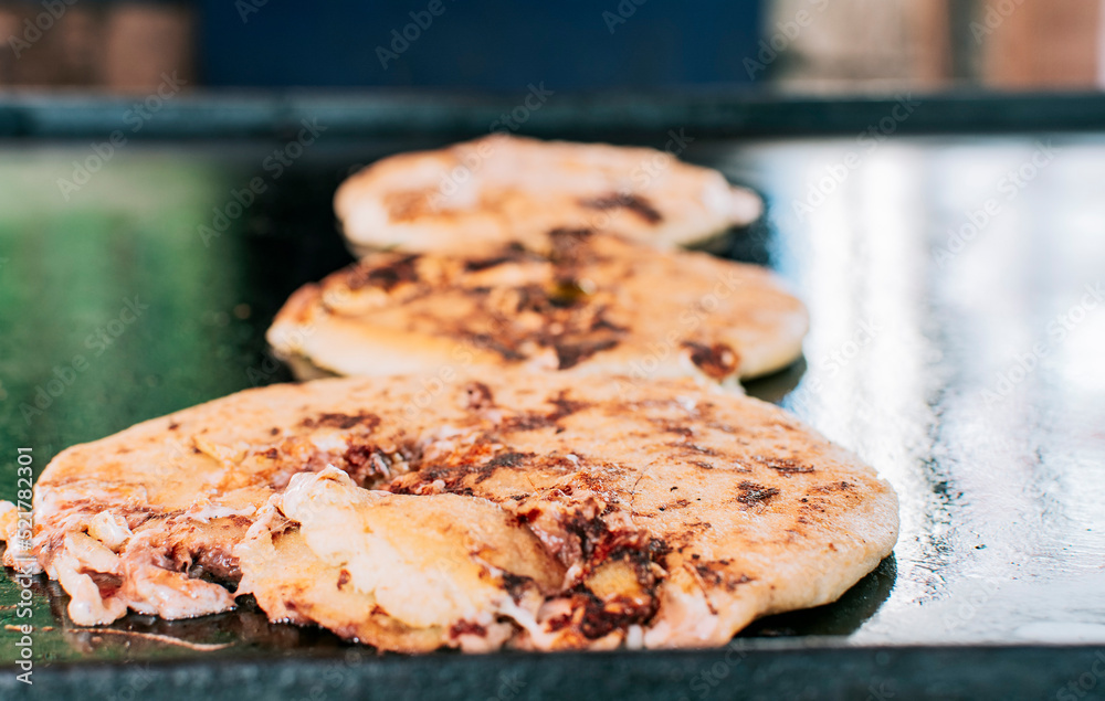 Traditional Nicaraguan pupusas with melted grilled cheese, Traditional ...