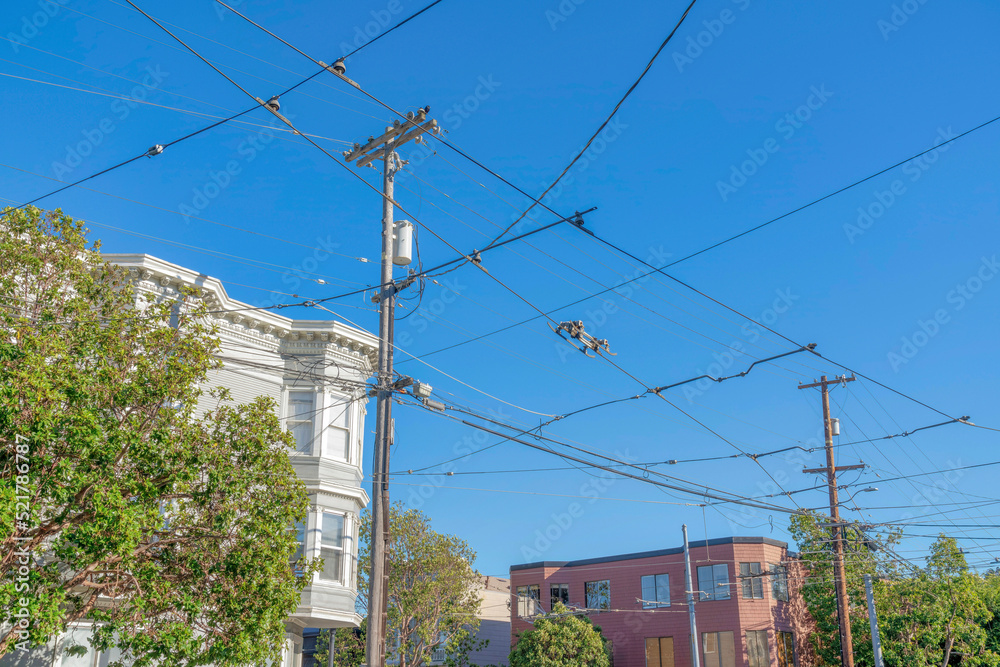 Cables and power lines above an intersection used to power the public ...