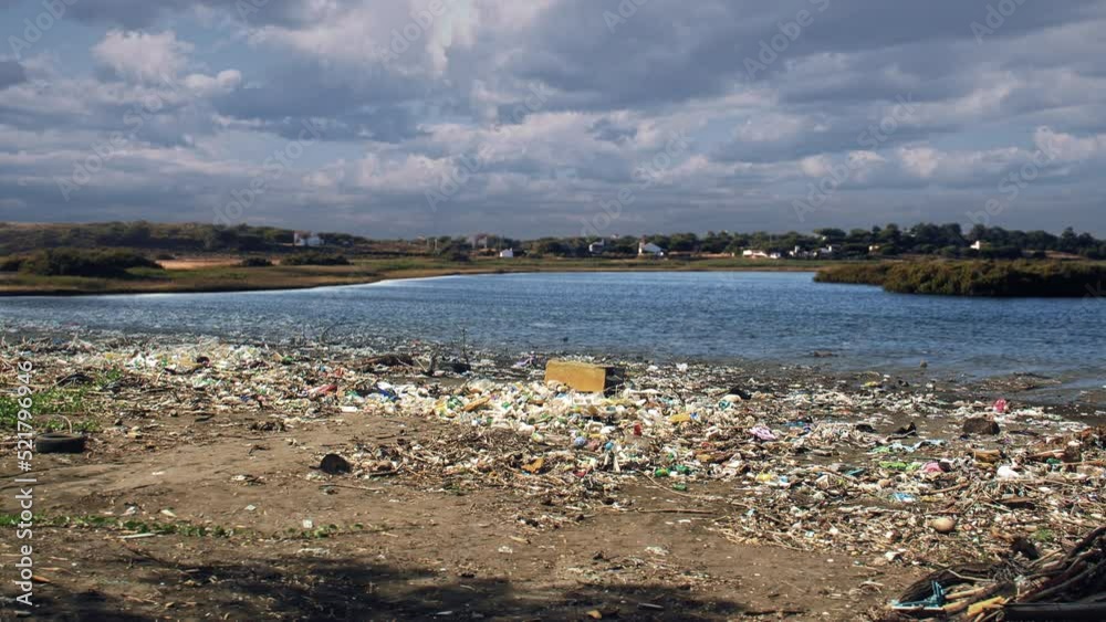 Toxic Waste Polluted River Trash Dumped Nature Disaster. Trash dumped ...