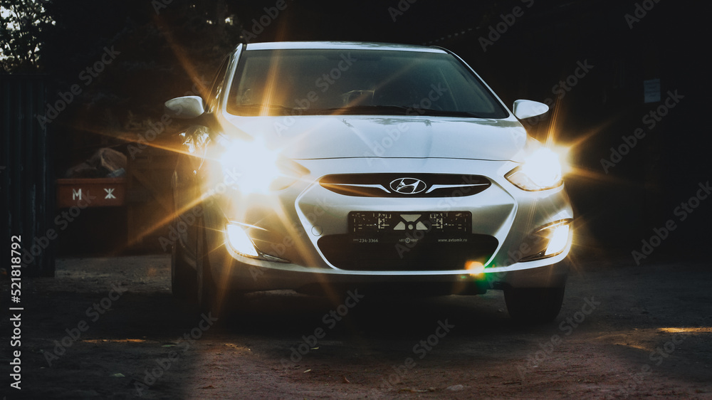 car Hyundai Solaris is parked on the street. Frontal view of silver ...