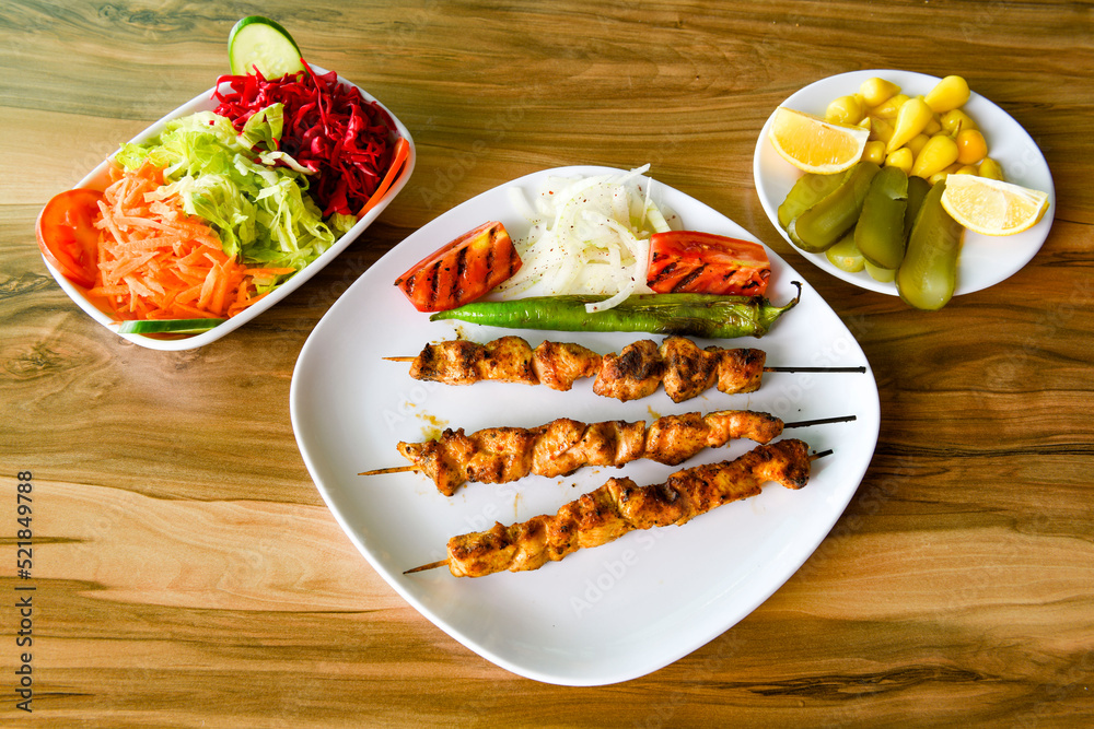 Chicken wings barbeque in a dish with BBQ grill sauce . Izgara tavuk ...