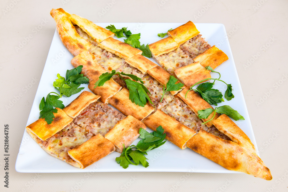 Turkish pita with minced cubed meat and cheese (Turkish name: Kiyma ...