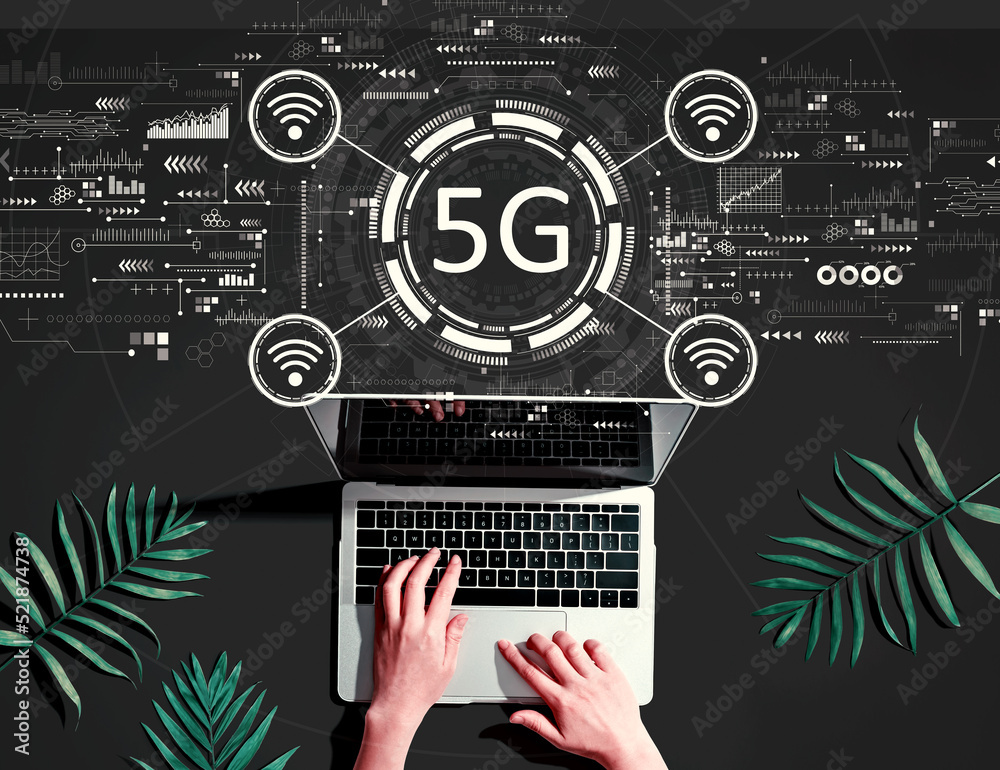 5G network with person using a laptop computer Stock Photo | Adobe Stock