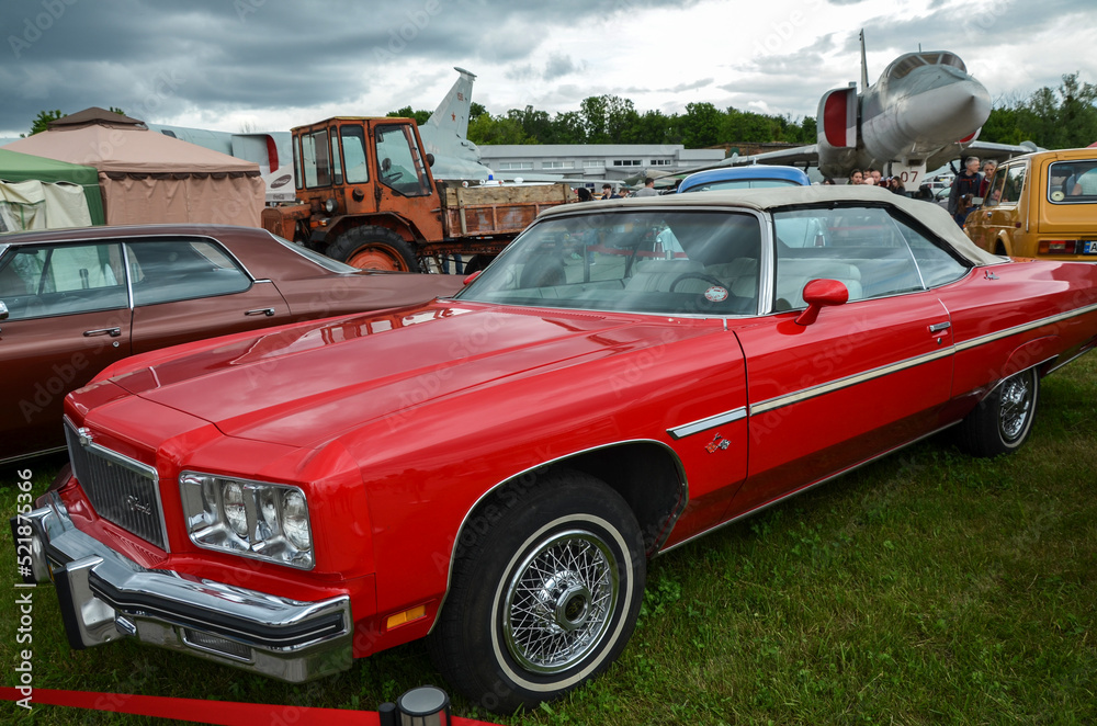 Red Chevrolet Impala Convertible 1975, length over 5 meters, under the ...