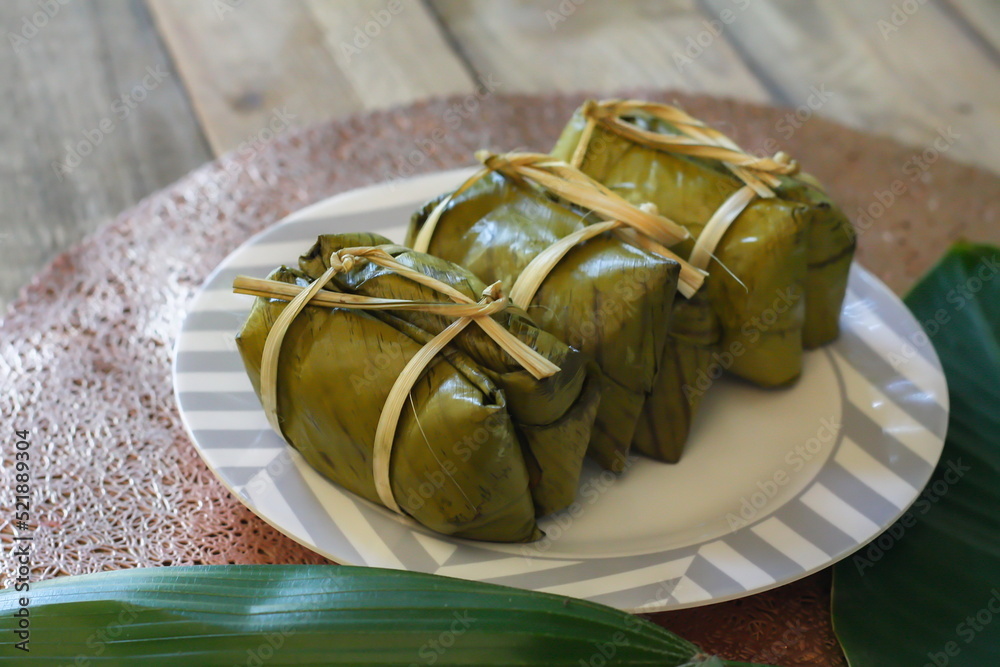 Thai desserts wrapped in banana leaves (Thai spiled khao tom mat ...