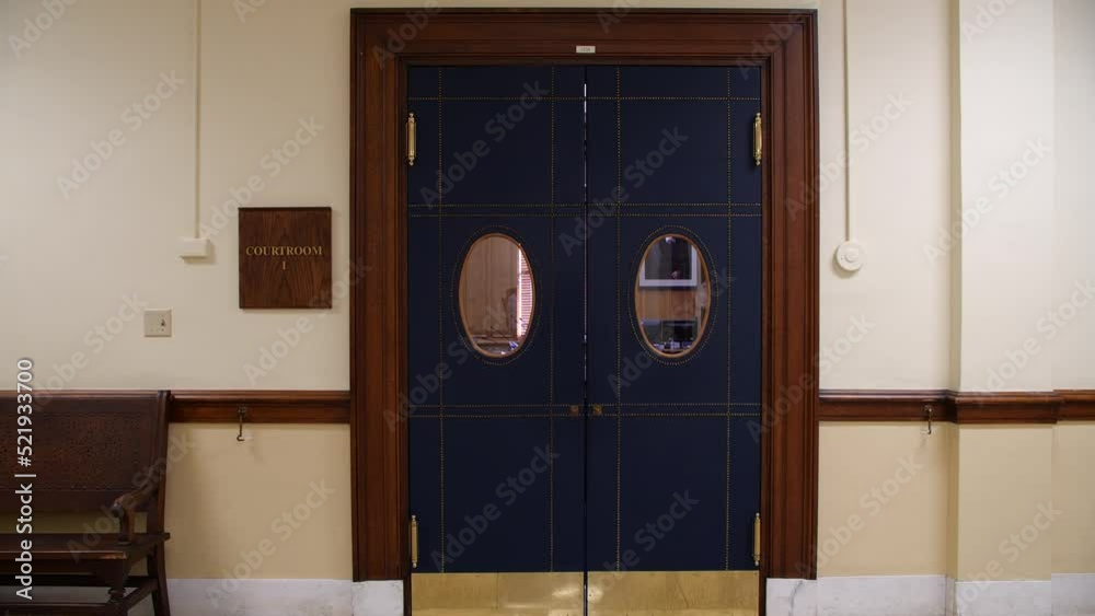 4k Courtroom trial doors leading into court room with sign on wall in ...