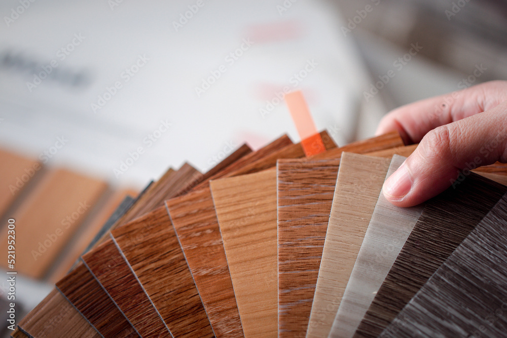 Vinyl plank collection : hand holding vinyl sample stack for floor tile ...