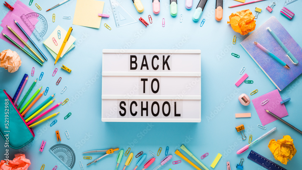 School stationery on a blue background. Back to school creative photo ...