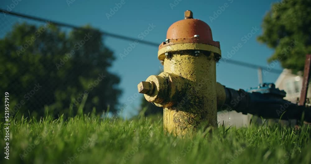 Leaking Fire Hydrant in Grass Closeup. Water Dripping from Leaky Pipe ...