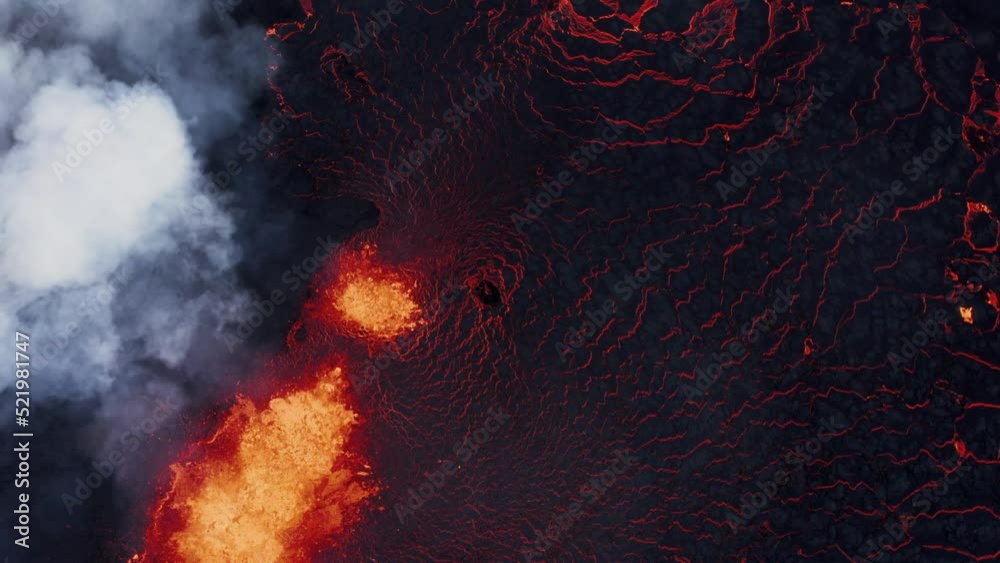 Burning lava on surface of earth, active fissure volcano spewing magma ...