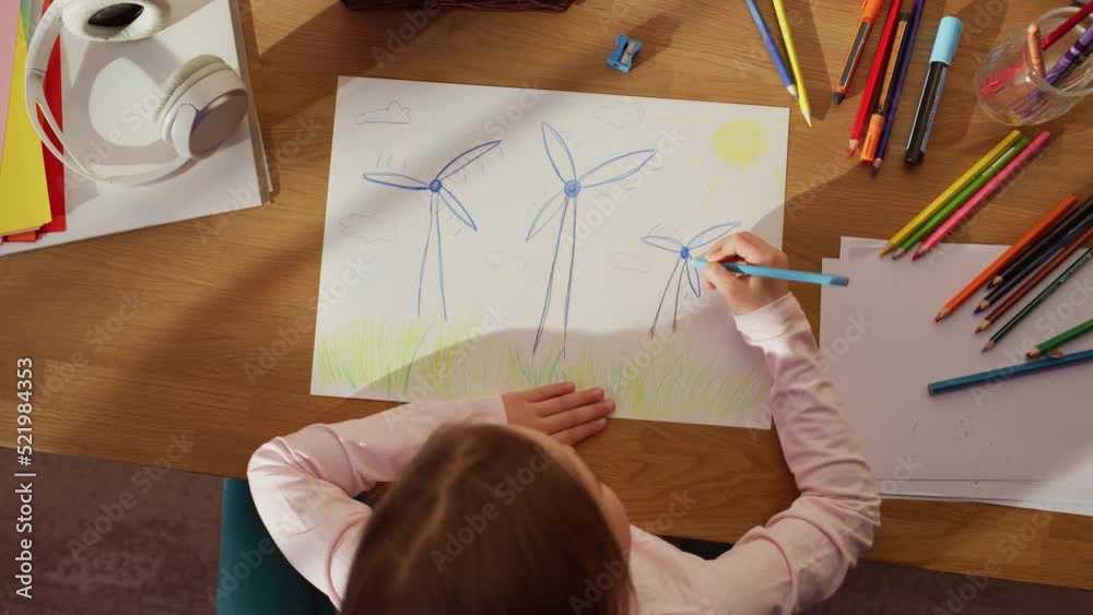 Top View: Little Girl Drawing Beautiful Wind Turbines that Look Like ...