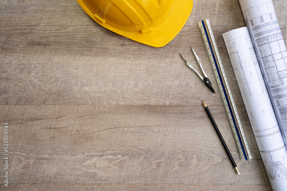 Flat lay of top view desk work table Engineer with Blueprint drawing ...