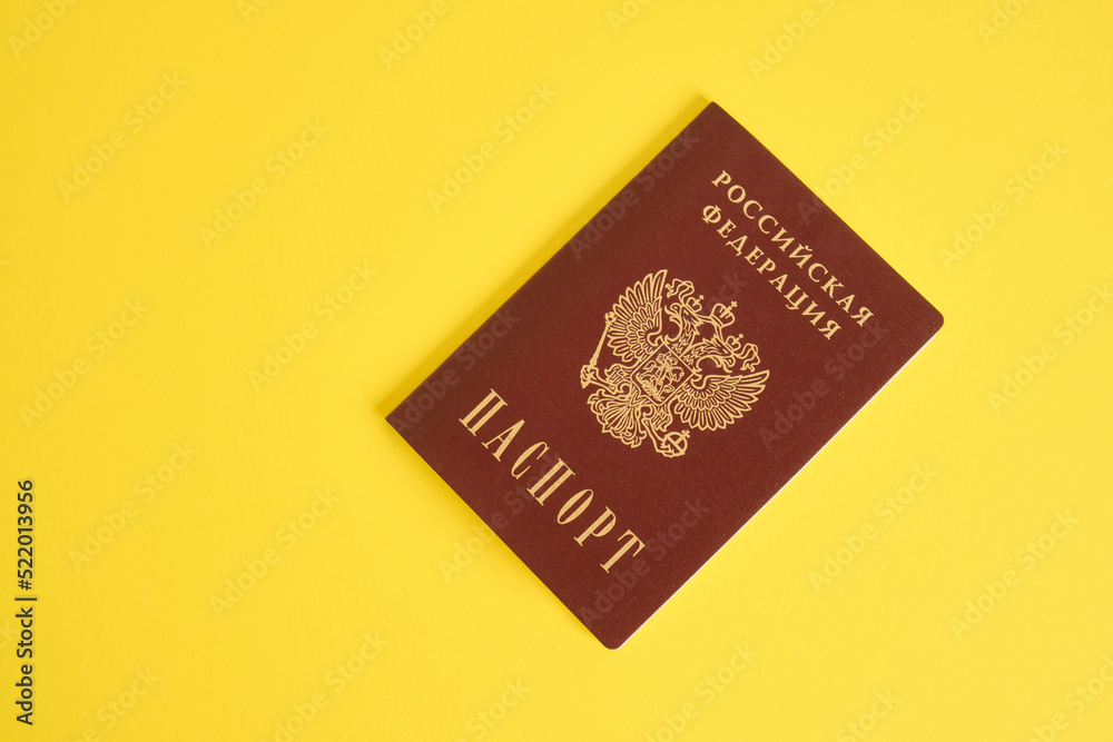 Russian passport on a yellow background copy space Stock Photo | Adobe ...