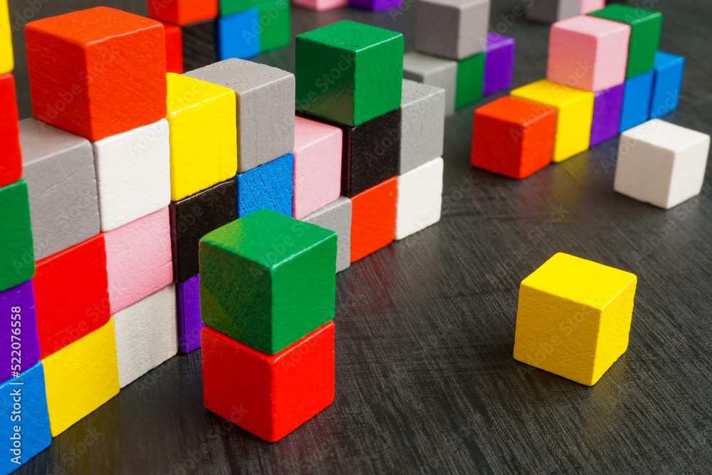 Multi-colored cubes on the surface as a symbol of complexity, diversity ...