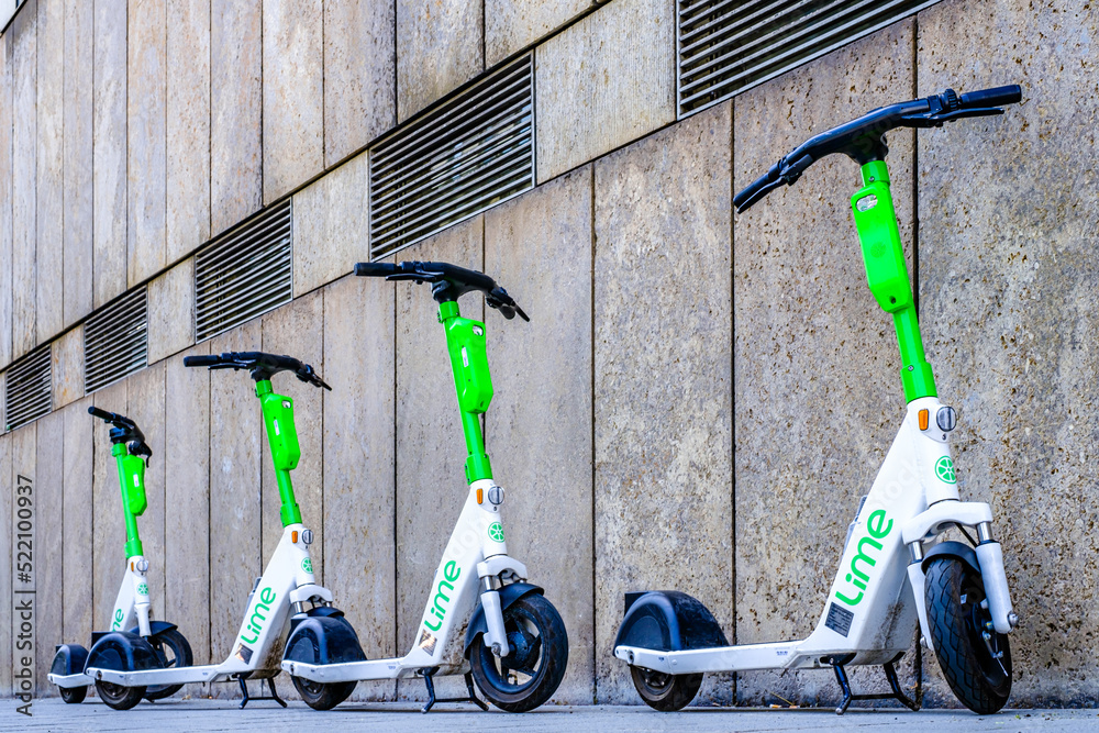 Munich, Germany - August 7: typical modern eScooters at a street in the ...