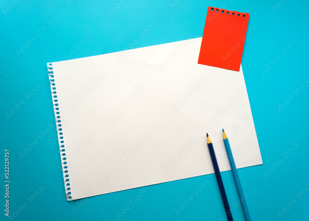 Blank sheet of paper space for design and lettering on a beautiful blue ...