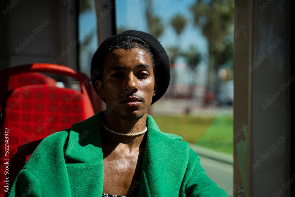 Handsome black man by bus portrait Stock Photo | Adobe Stock