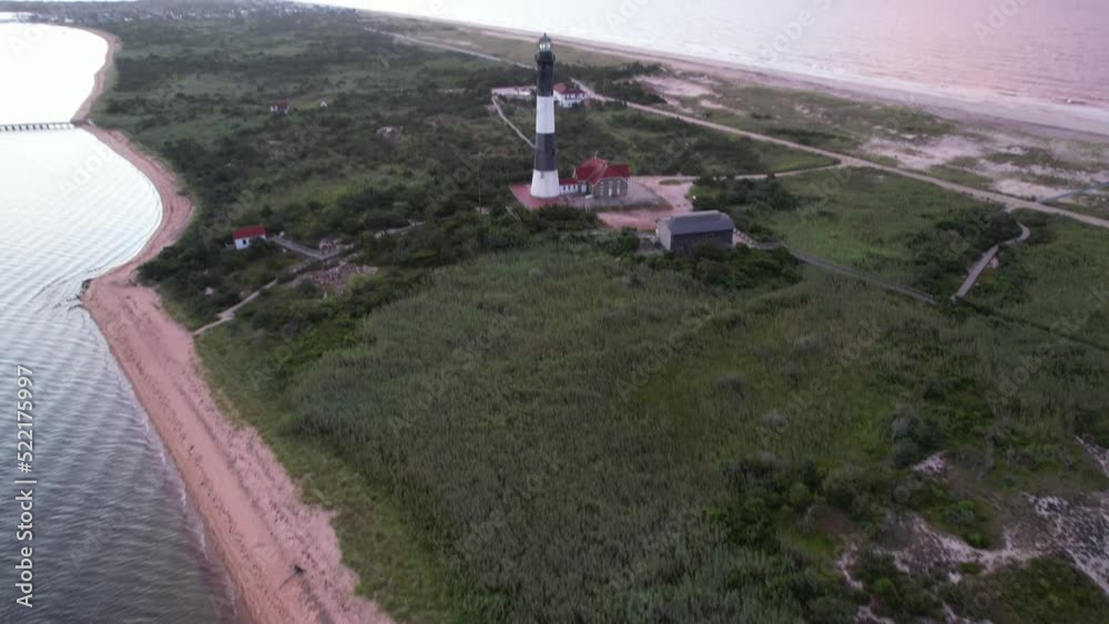 An aerial view of the iconic Fire Island Lighthouse during a colorful ...