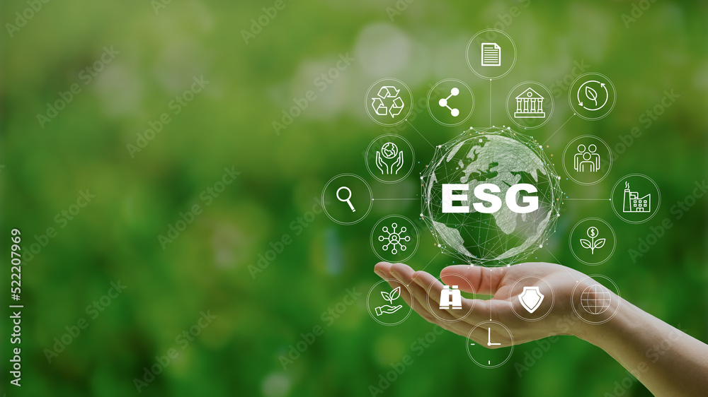 ESG icon concept in the woman hand for environmental, social, and ...