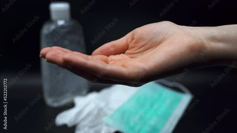 Person using antibacterial gel rub for hands washing during covid-19 ...