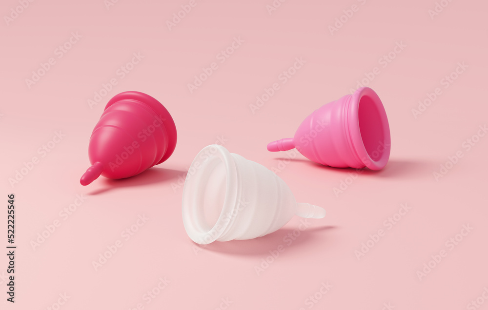 Three menstrual cups isolated on a pink background for banner design ...