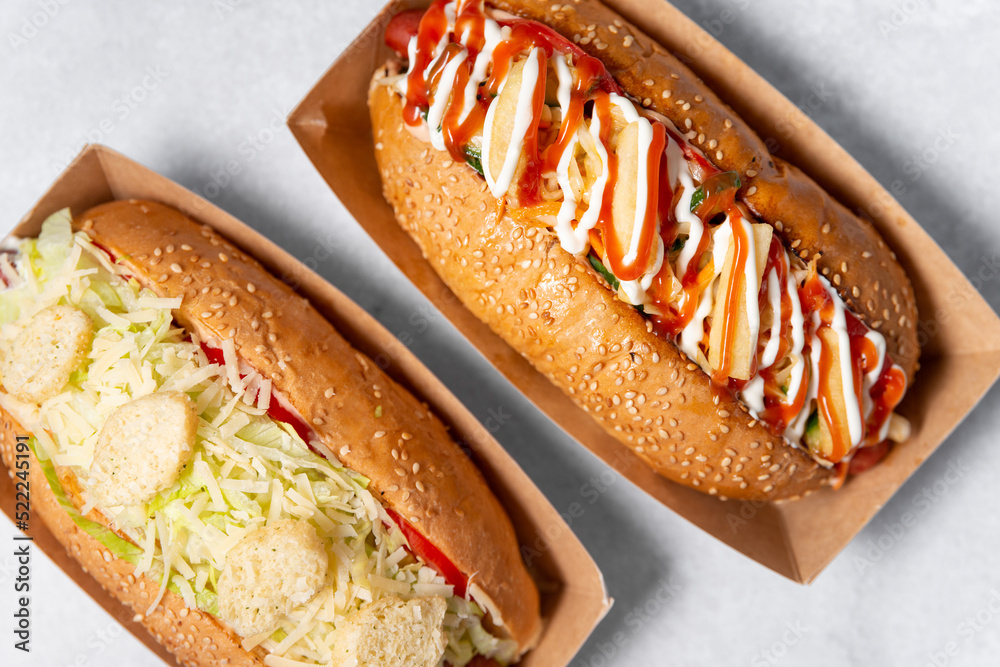 Fast food hot dog banner on a light grey stone textured background ...