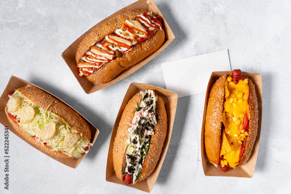 Fast food hot dog banner on a light grey stone textured background ...