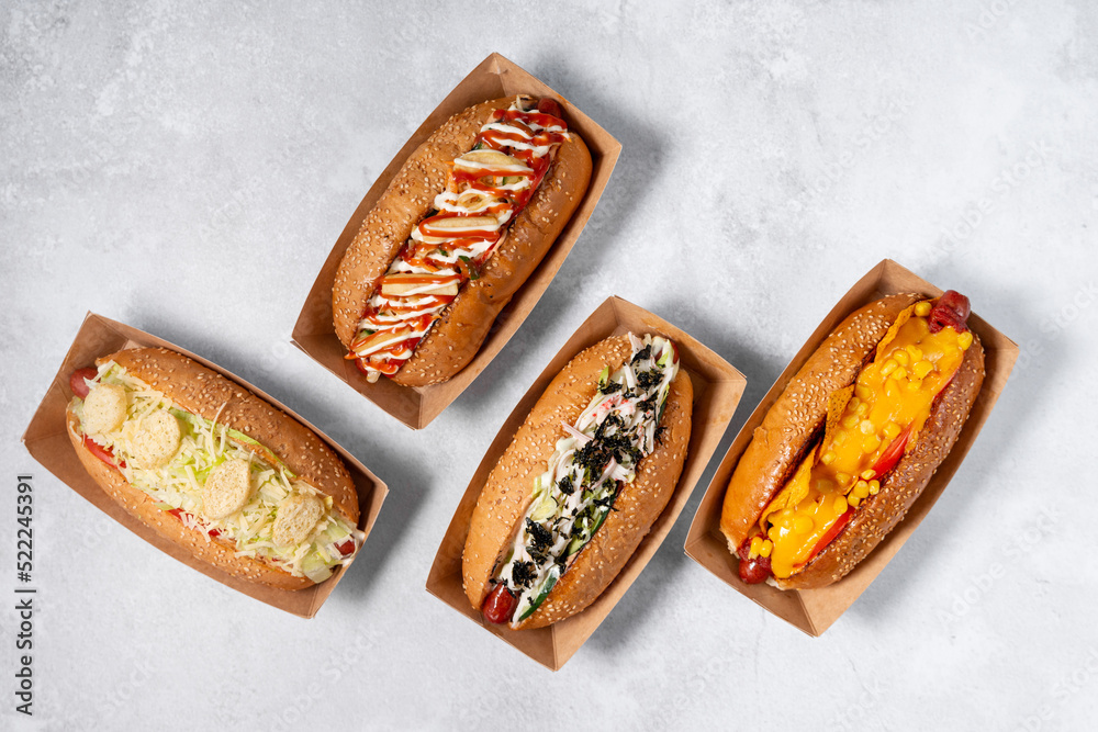 Fast food hot dog banner on a light grey stone textured background ...