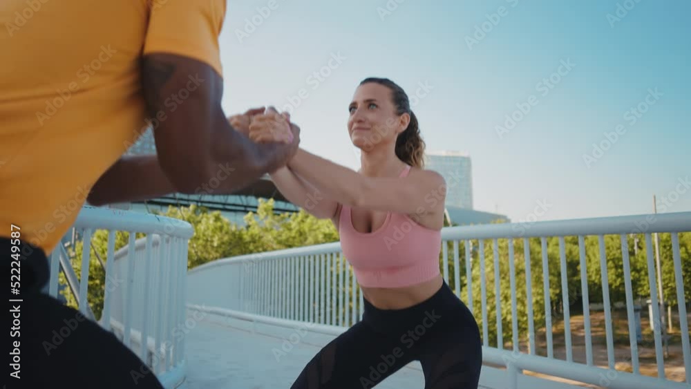 Cinematic video of urban runners athletes training outdoor in a modern ...