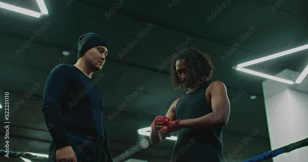 professional fight coach and african american beginner fighter in fight ...