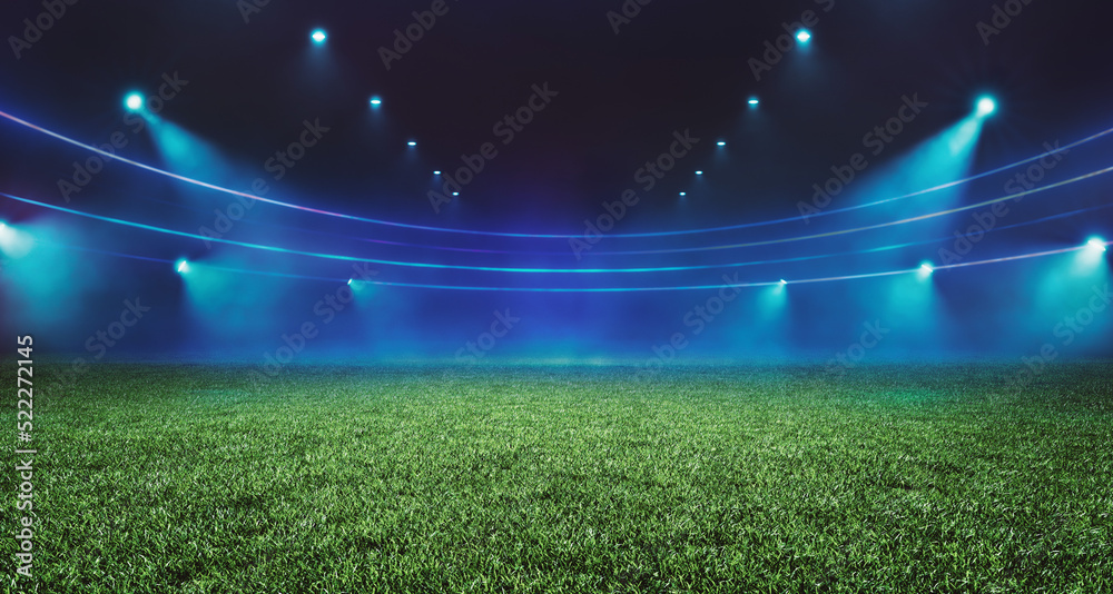 Grand football stadium green pitch view illuminated by spotlights and ...