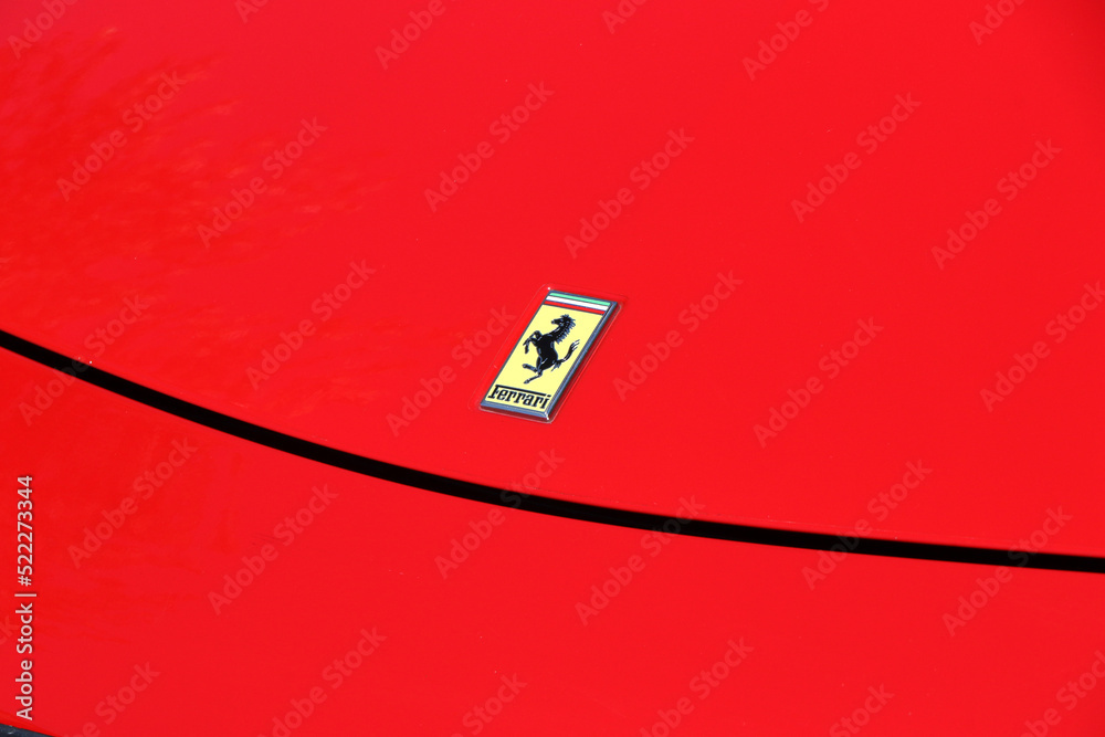 Bonnet of a Ferrari Testarossa with the logo with the prancing horse ...