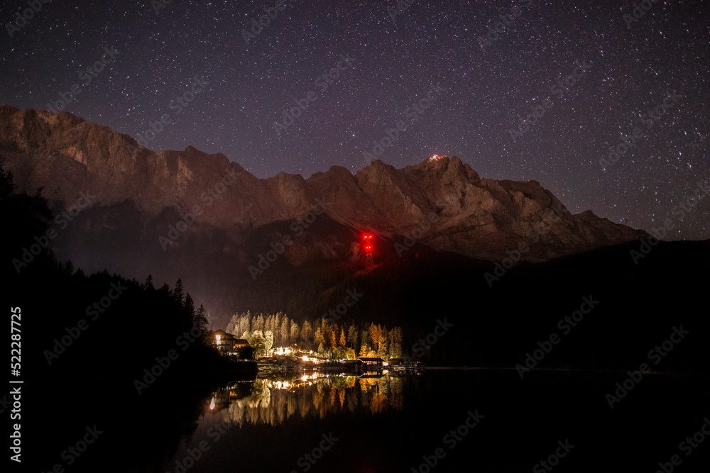 nightscape, night full of stars, view at the mountain Zugspitze with a ...