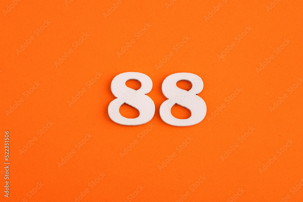 Number 88 - On orange foam rubber background Stock 写真 | Adobe Stock