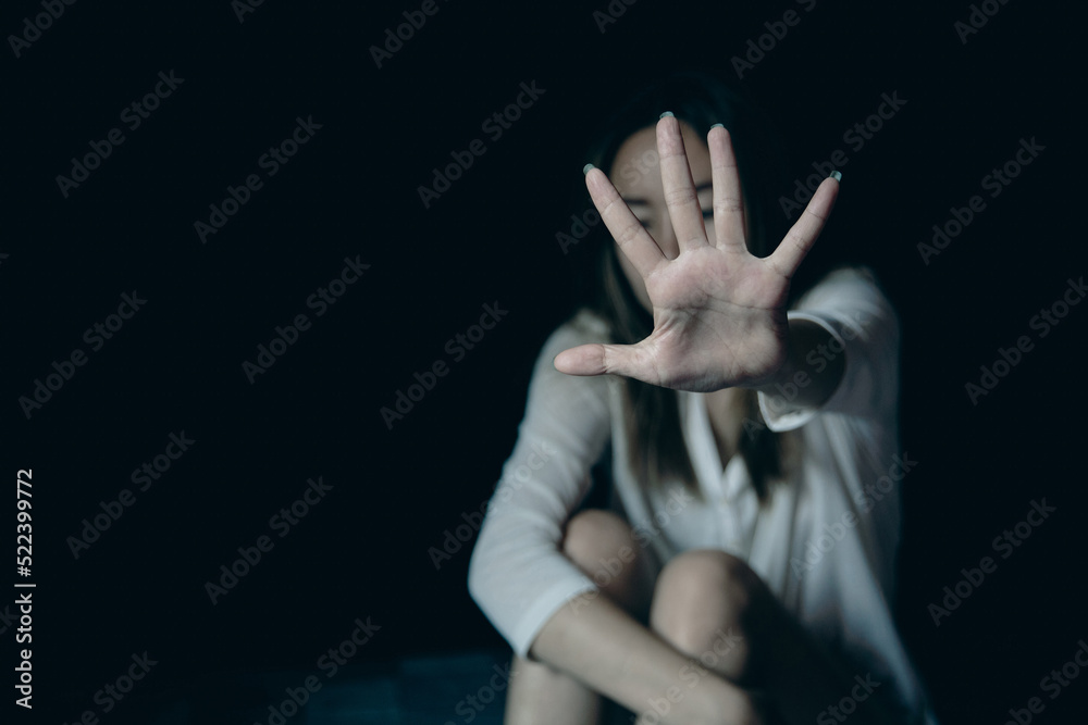 Stop hurting woman! young female person raised her hand for stop ...
