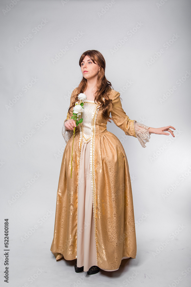 Full length portrait of a woman in a gold dress in the style of the ...