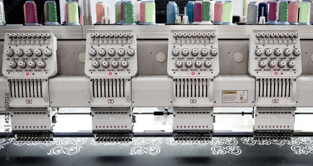 Modern computer programmable embroidery machine in garment industry ...