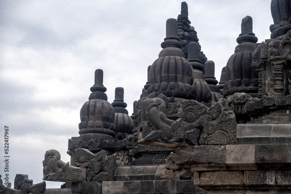 Detail ornament of Prambanan Temple. The temple is adorned with panels ...